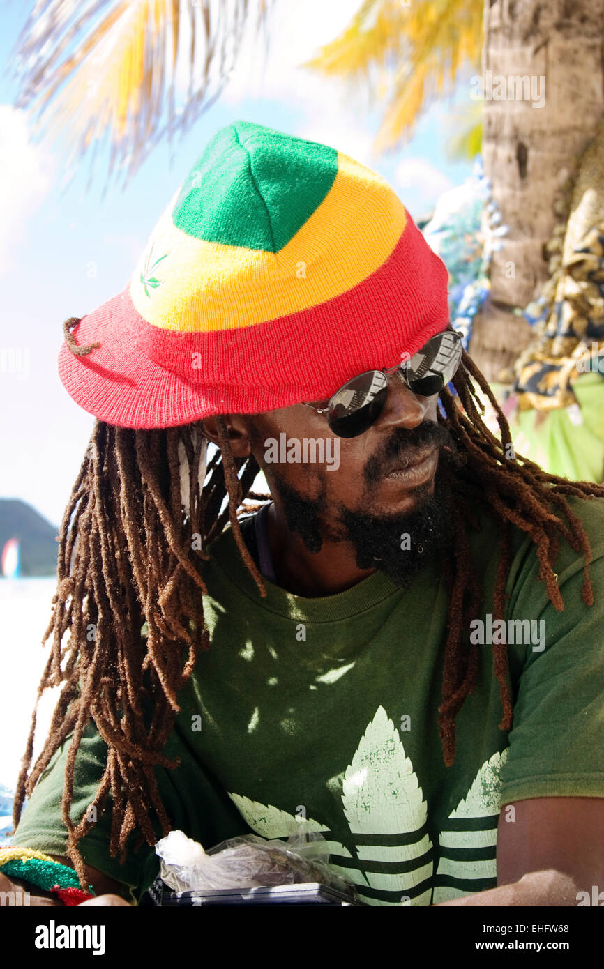 Rasta man on Jolly beach Antigua Stock Photo - Alamy