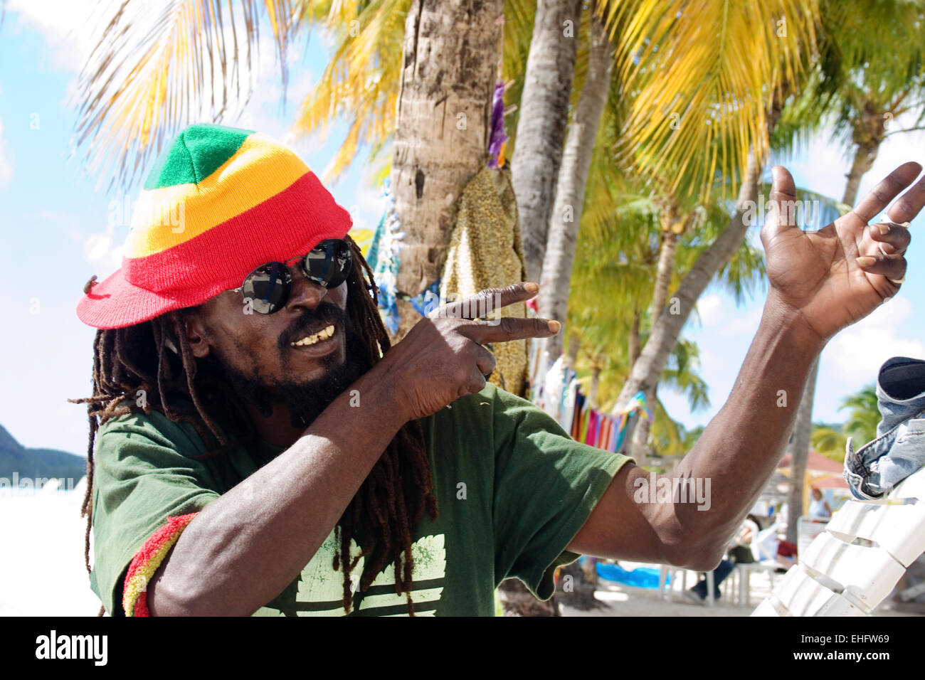 Rasta man on Jolly beach Antigua Stock Photo - Alamy