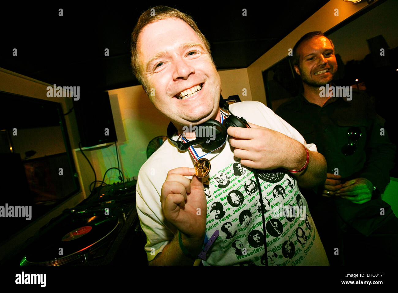 Stuart Patterson shows off medal whilst DJing at Bestival on the Isle ...