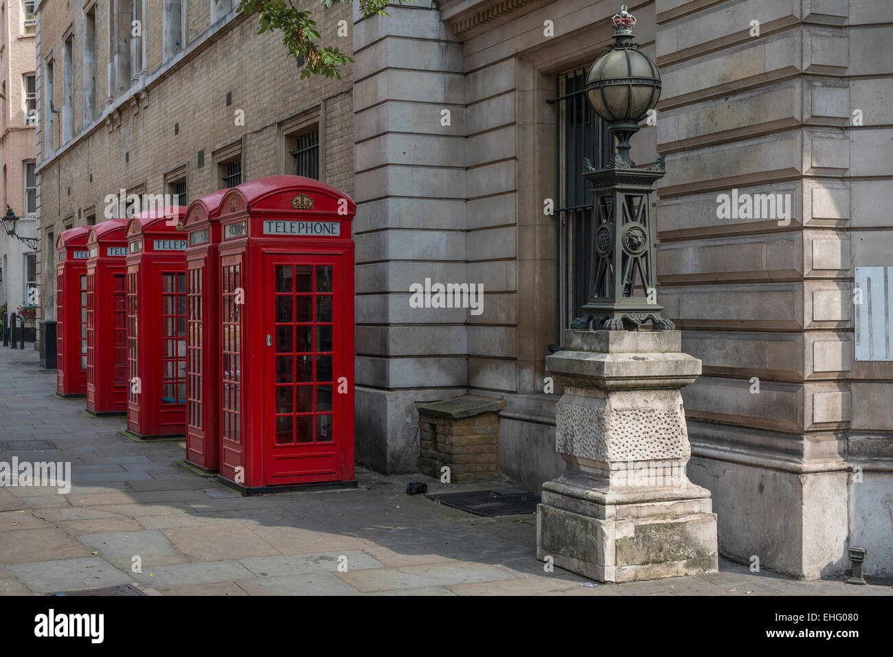Traditional red K2 telephone kiosks in a row near Covent Garden in ...