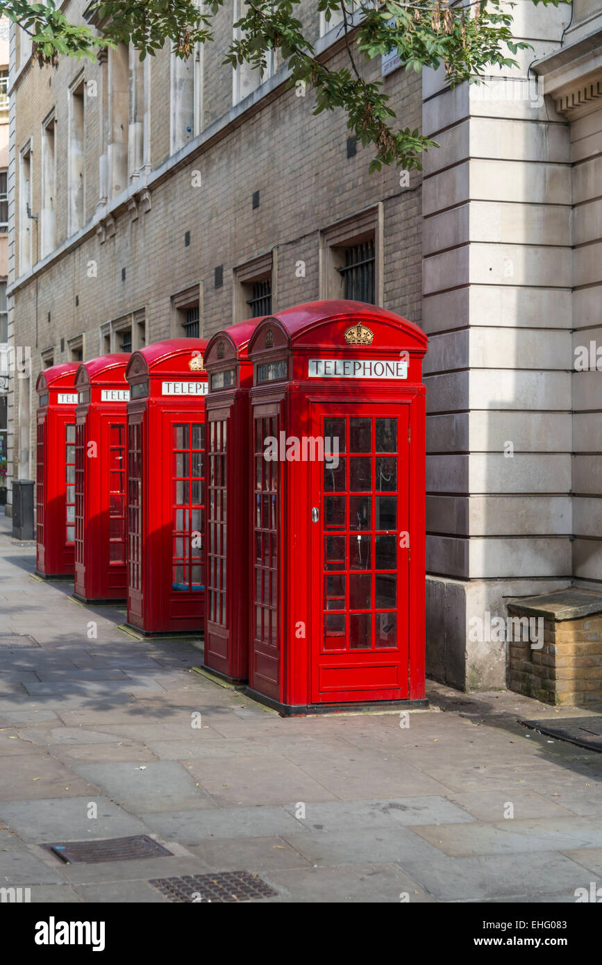 Traditional red K2 telephone kiosks in a row near Covent Garden in ...