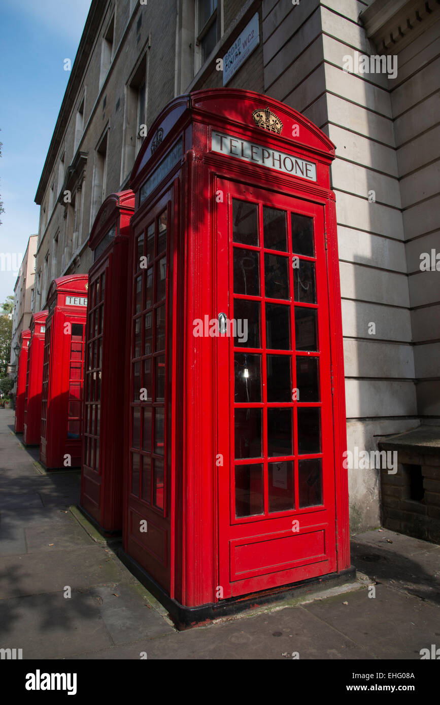 Traditional red K2 telephone kiosks in a row near Covent Garden in ...