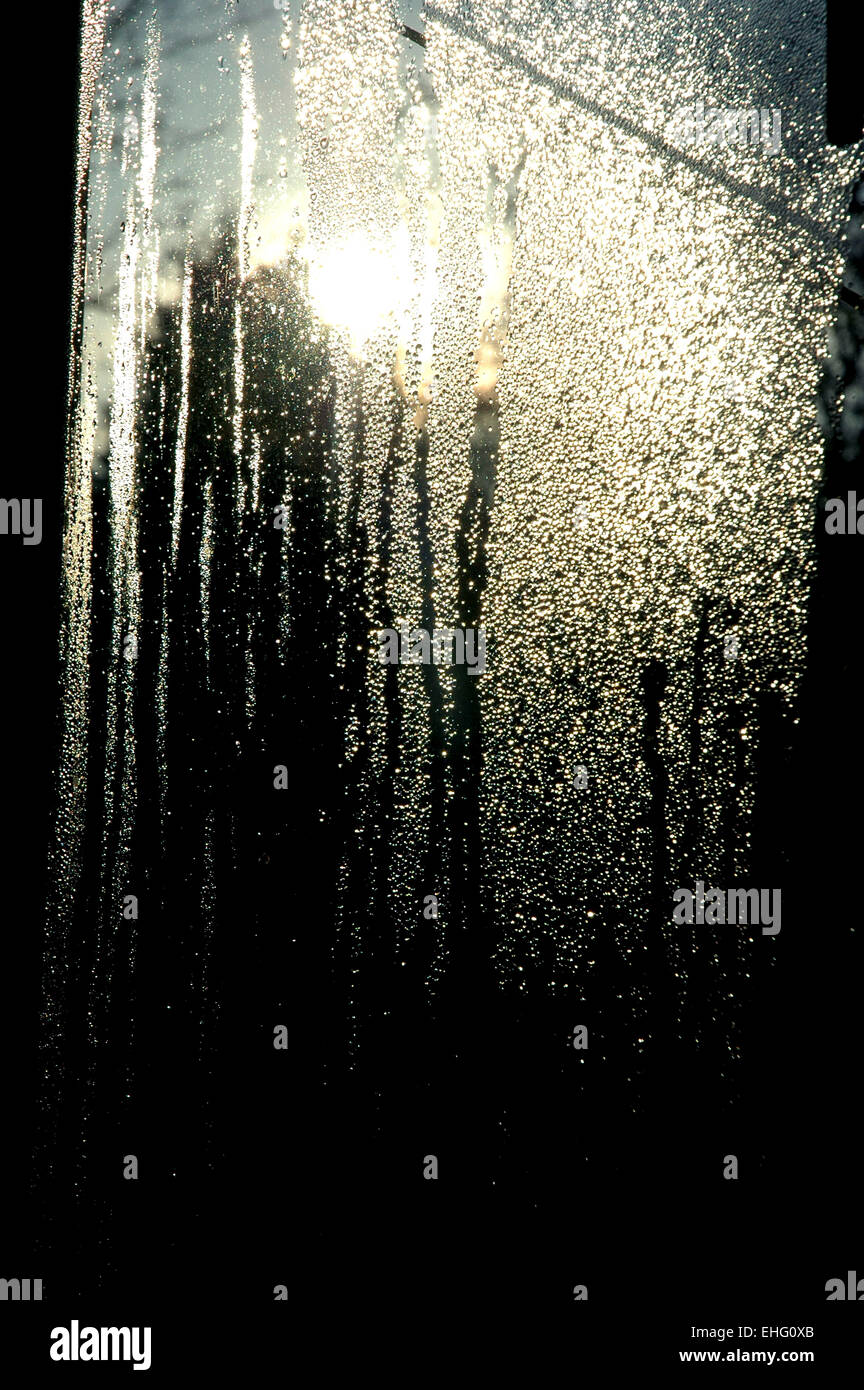 Condensation on the inside of a kitchen window Stock Photo - Alamy