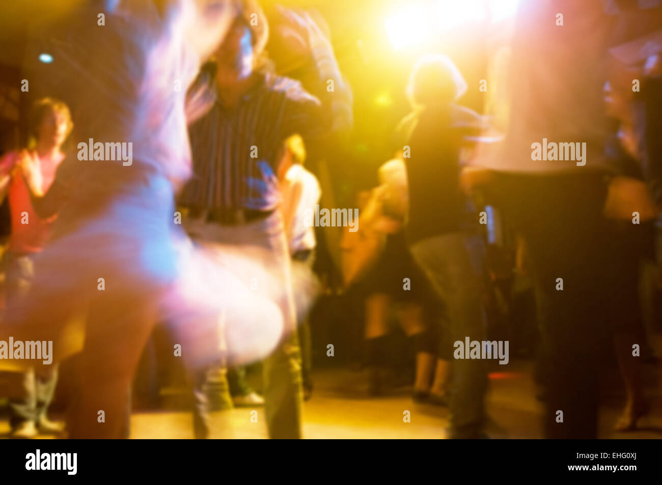 People dancing at the party abstract blur background with bokeh Stock ...