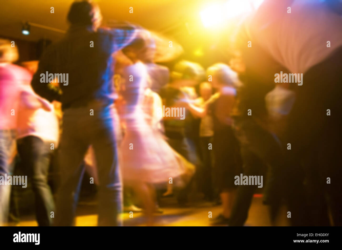 People dancing at the party abstract blur background with bokeh Stock ...