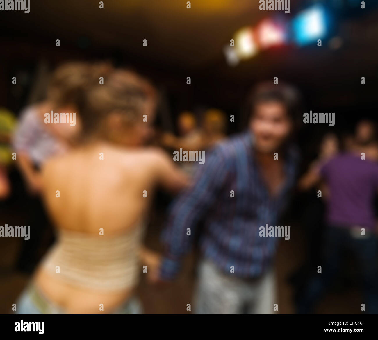 People dancing at the party abstract blur background with bokeh Stock ...