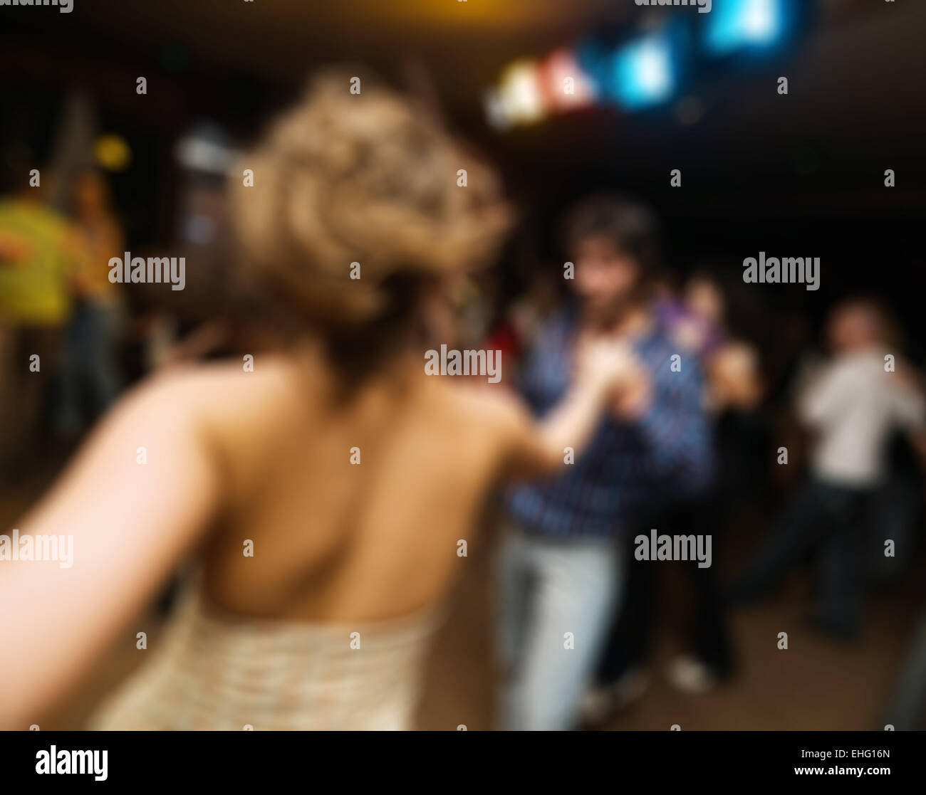 People dancing at the party abstract blur background with bokeh Stock ...
