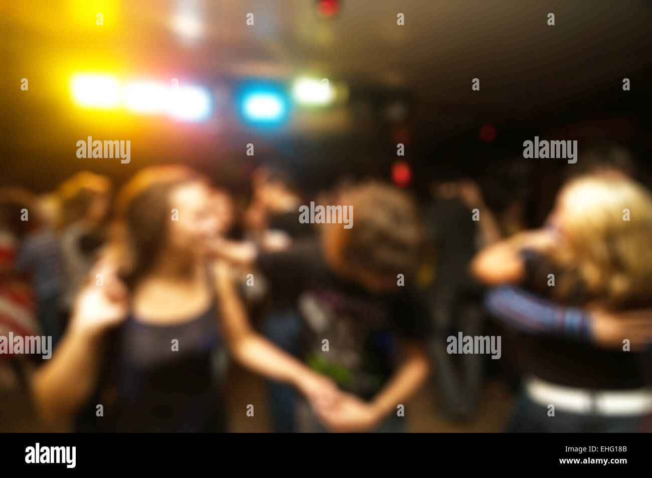 People dancing at the party abstract blur background with bokeh Stock ...