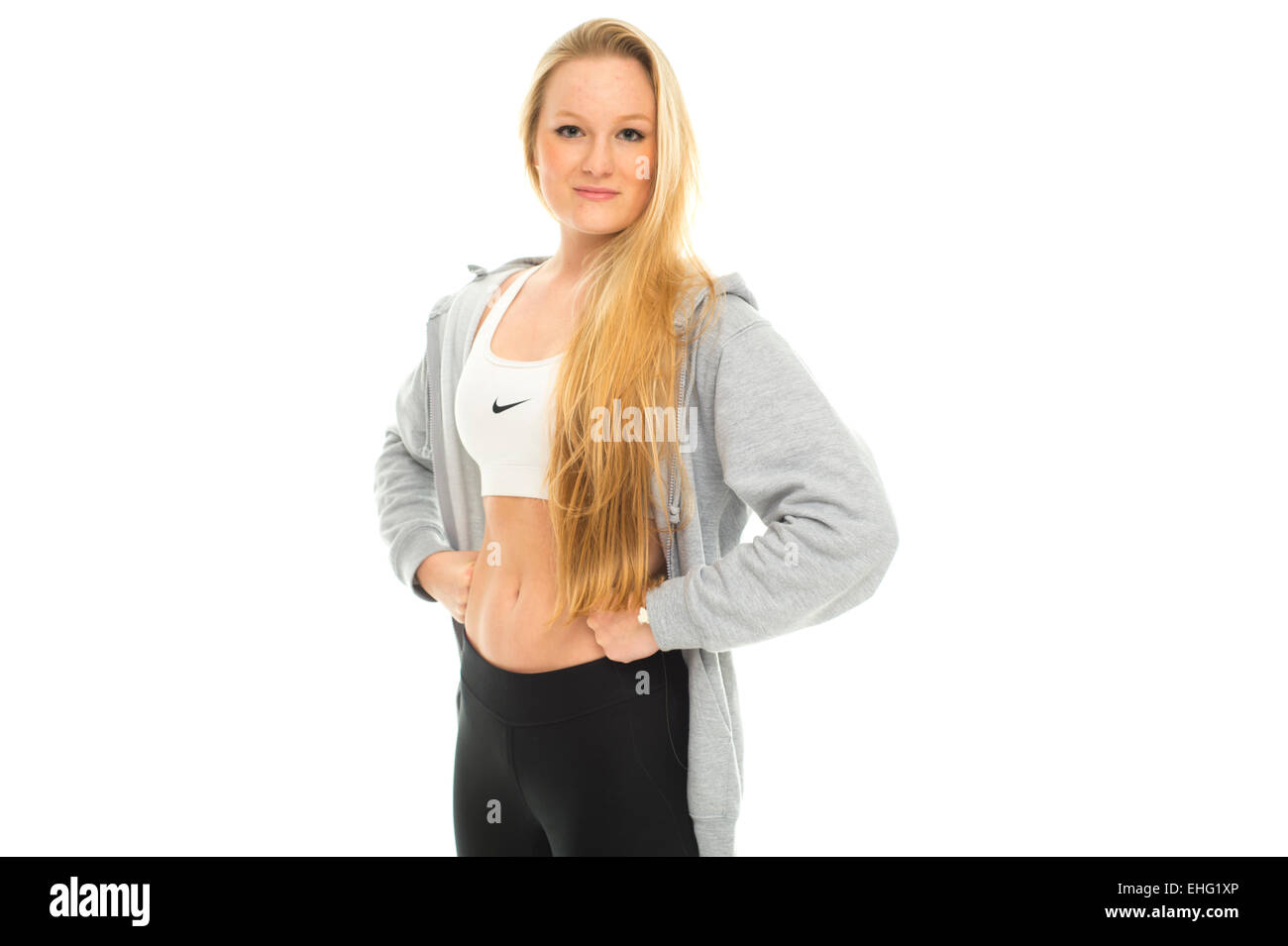 A young confident slim healthy sporty fit woman 19 year old teenage ...