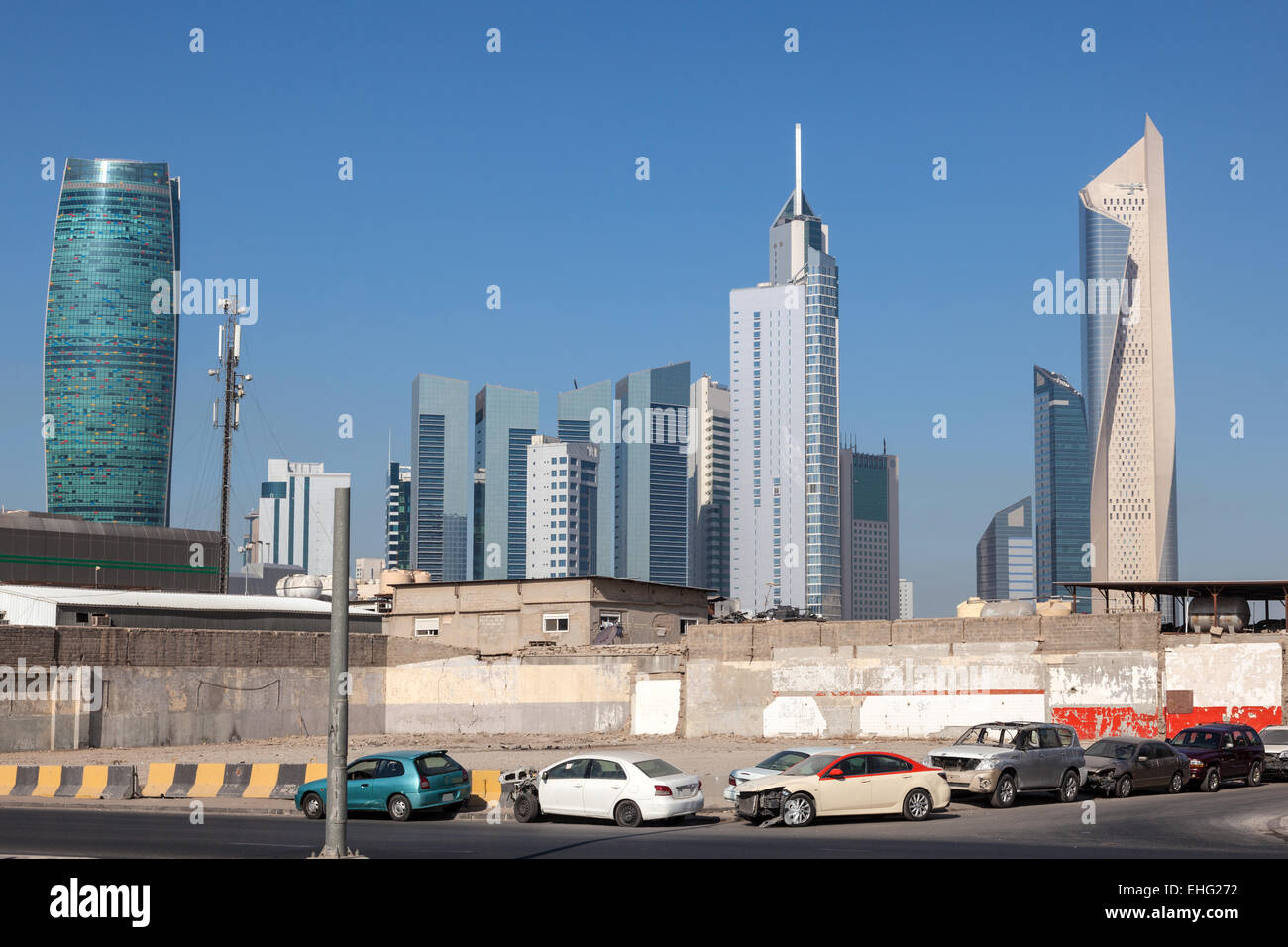 Broken cars in a street downtown in Kuwait City, Middle East Stock ...