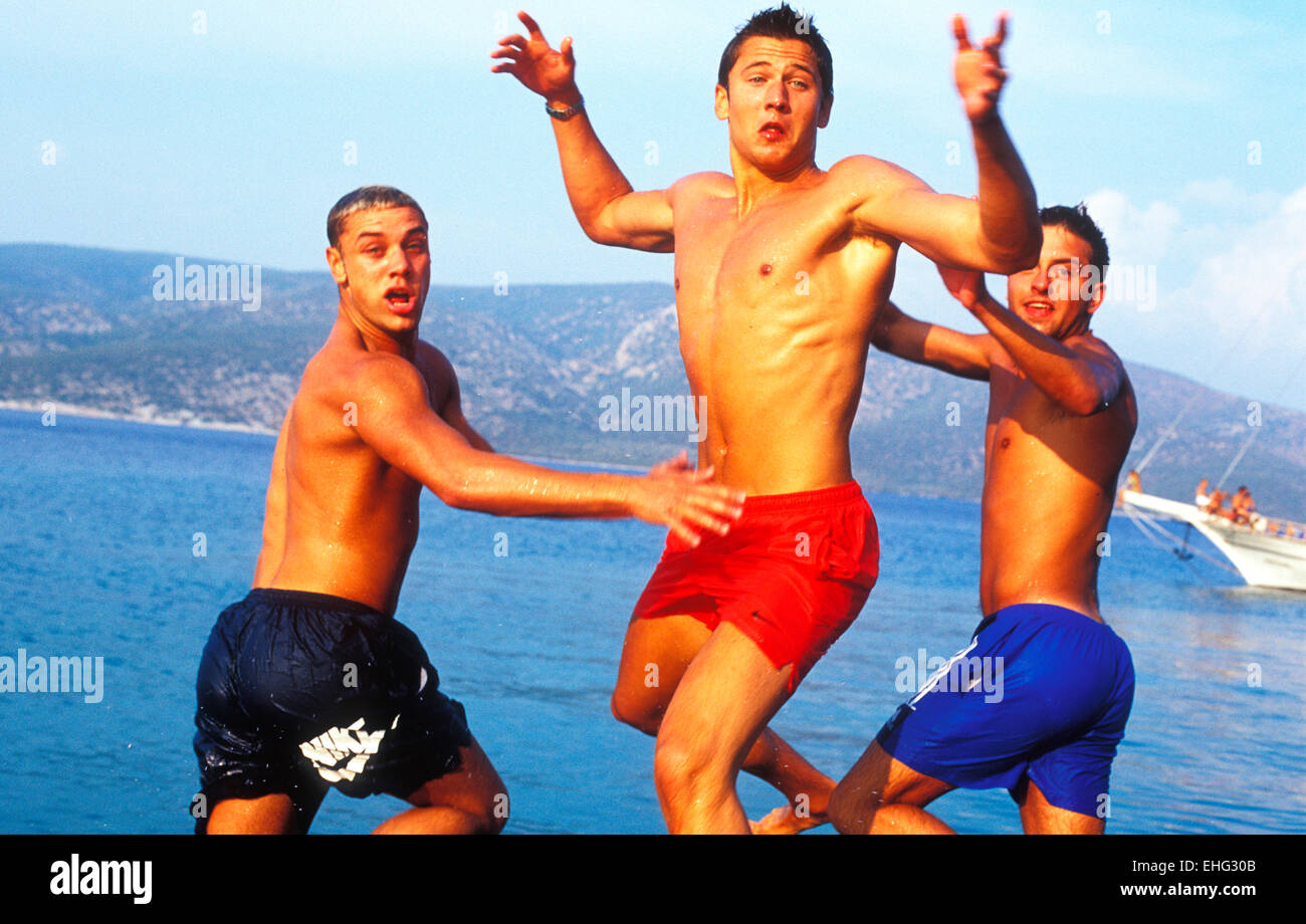 Three guys hi-res stock photography and images - Alamy