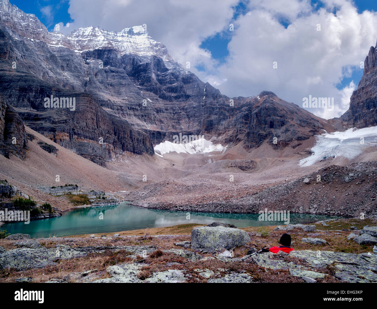 Man resting at Opabin Lake and Hungabee Mountain,Yoho National Park ...