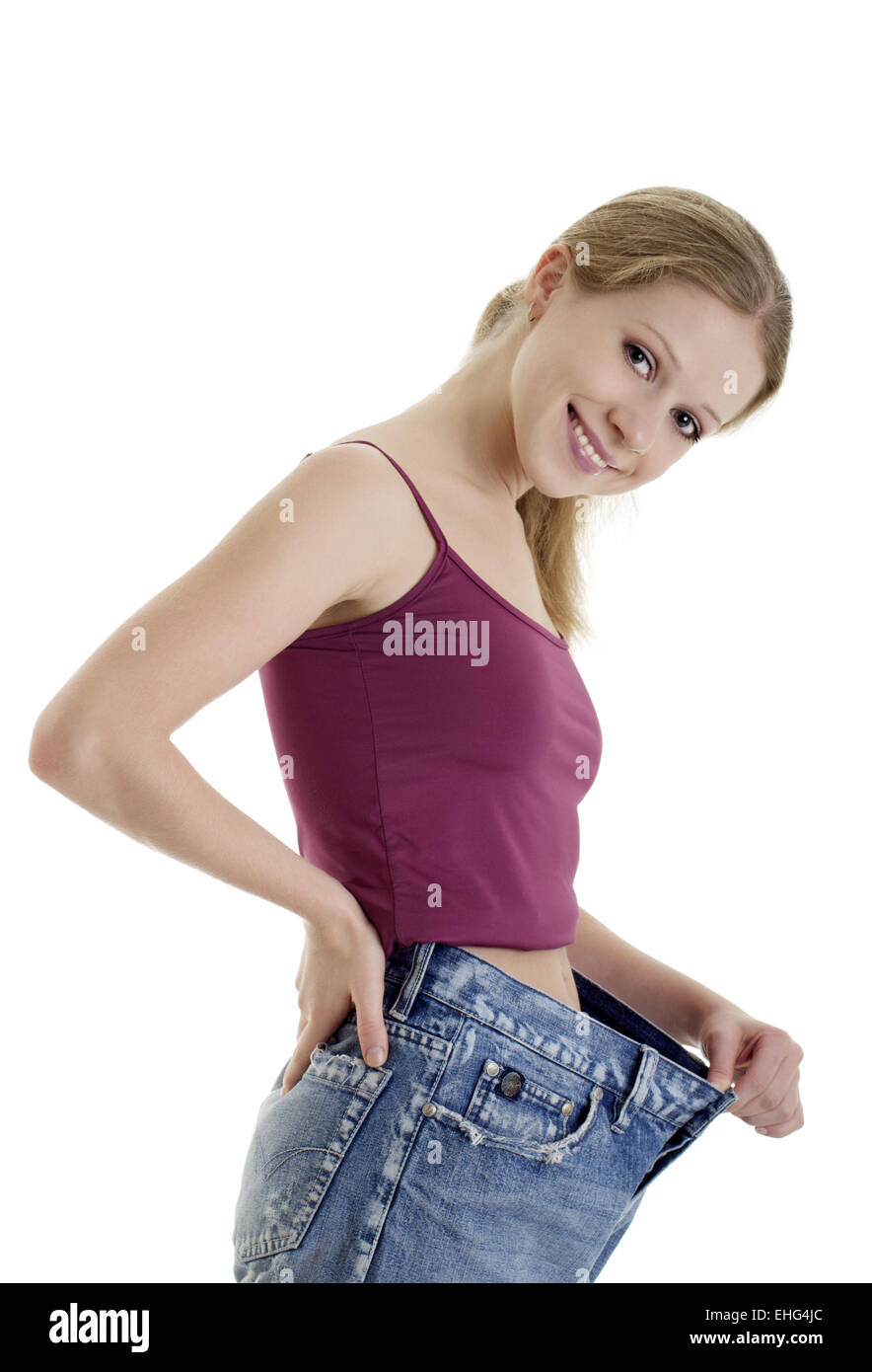 pretty girl in jeans lost weight Stock Photo - Alamy