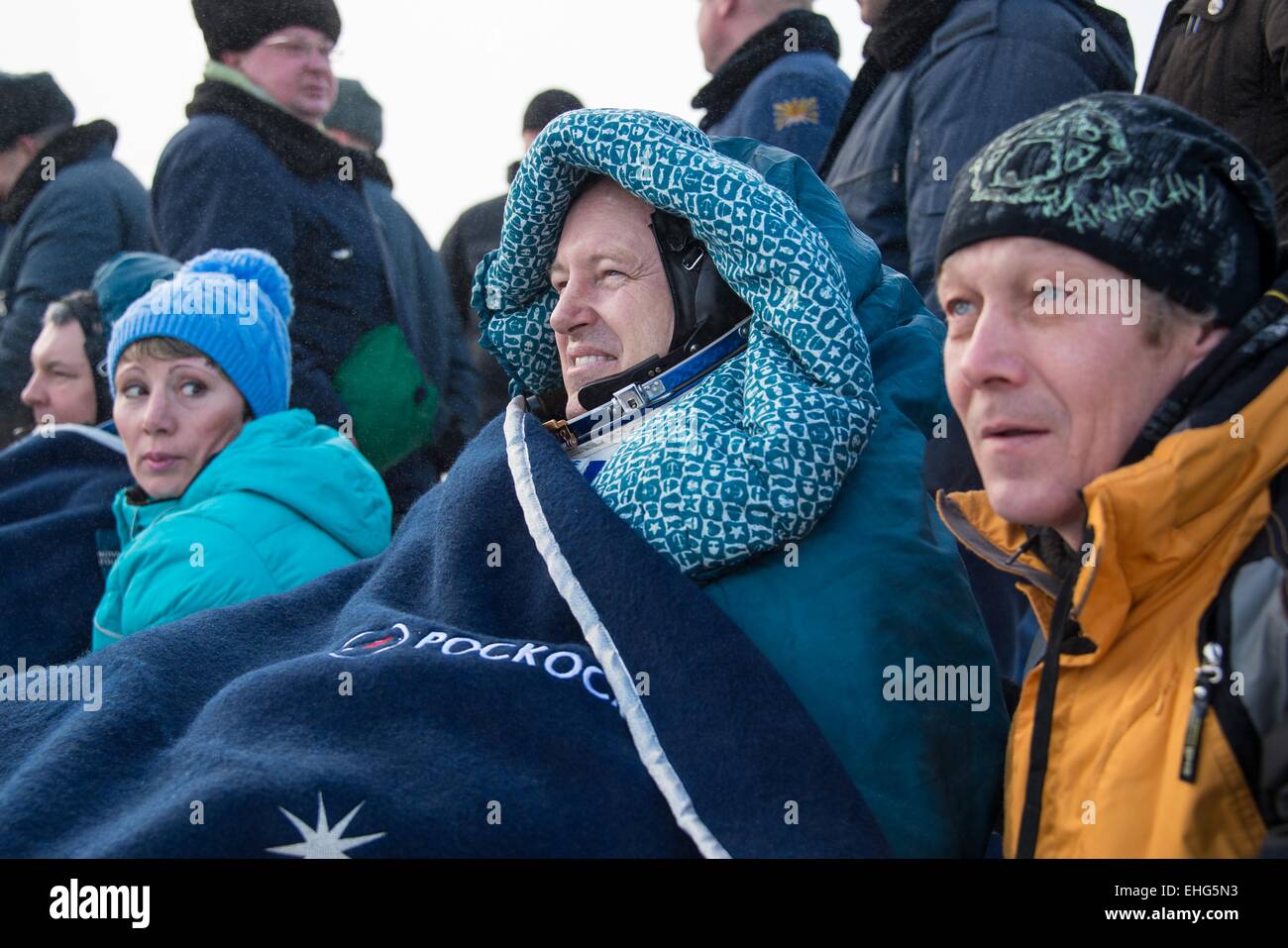 ISS Expedition 42 commander NASA Astronaut Barry Wilmore sit in a chair ...