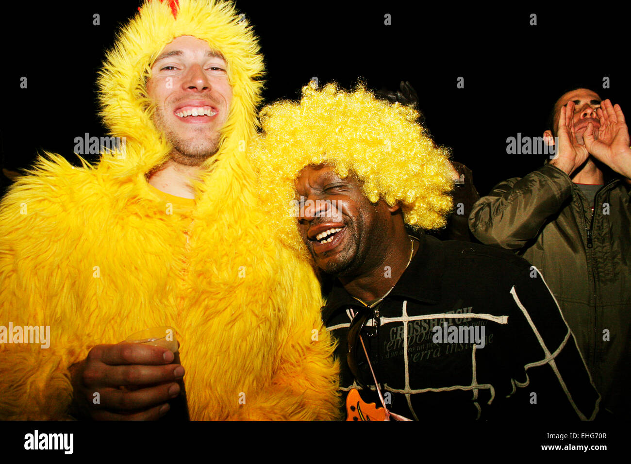 Guy hugging a chicken at the Pego festival Spain Stock Photo - Alamy
