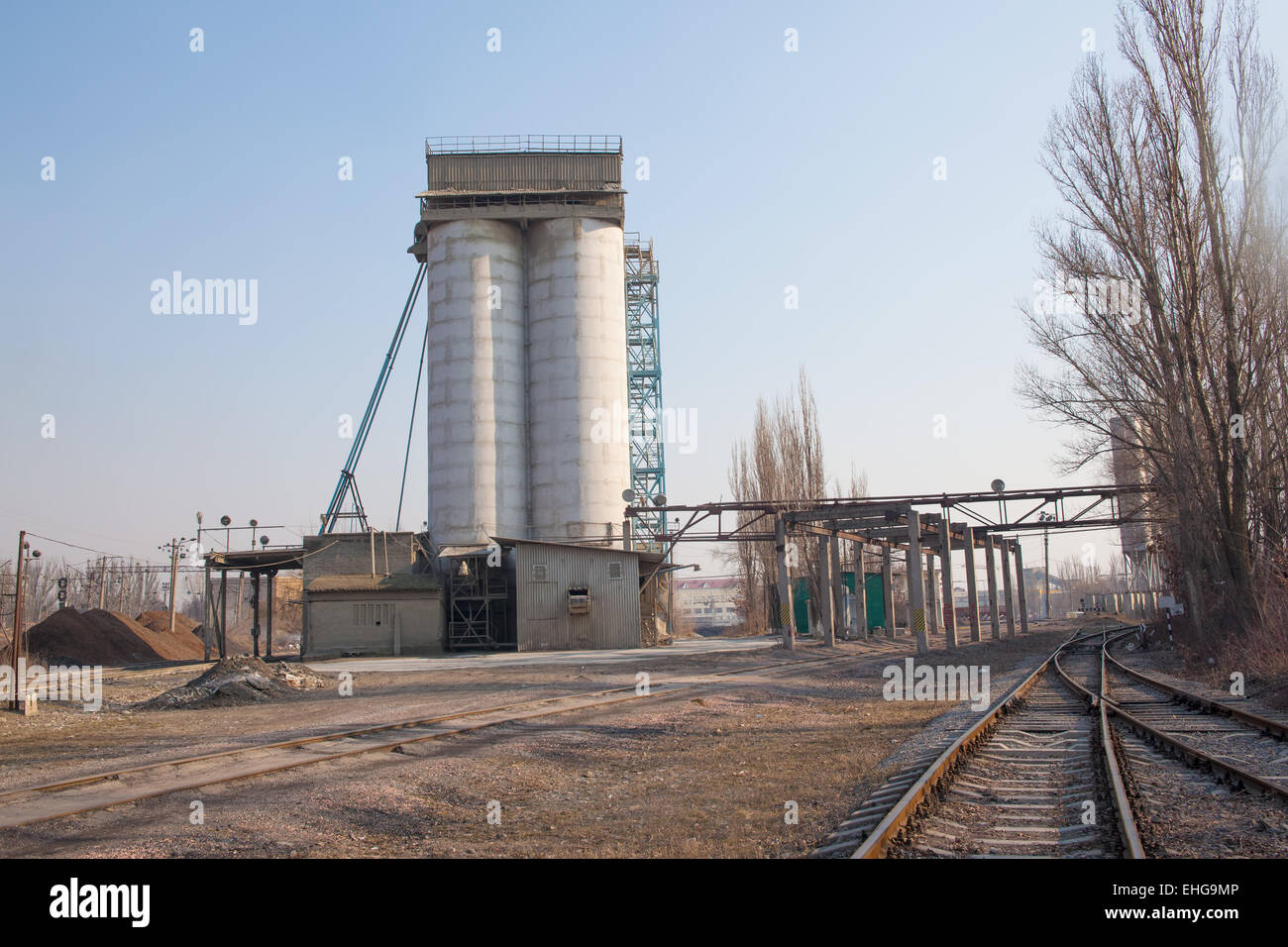 Cement factory production site and railway track Stock Photo - Alamy