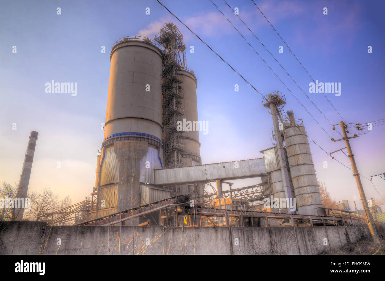 Cement factory at sunset hi-res stock photography and images - Alamy