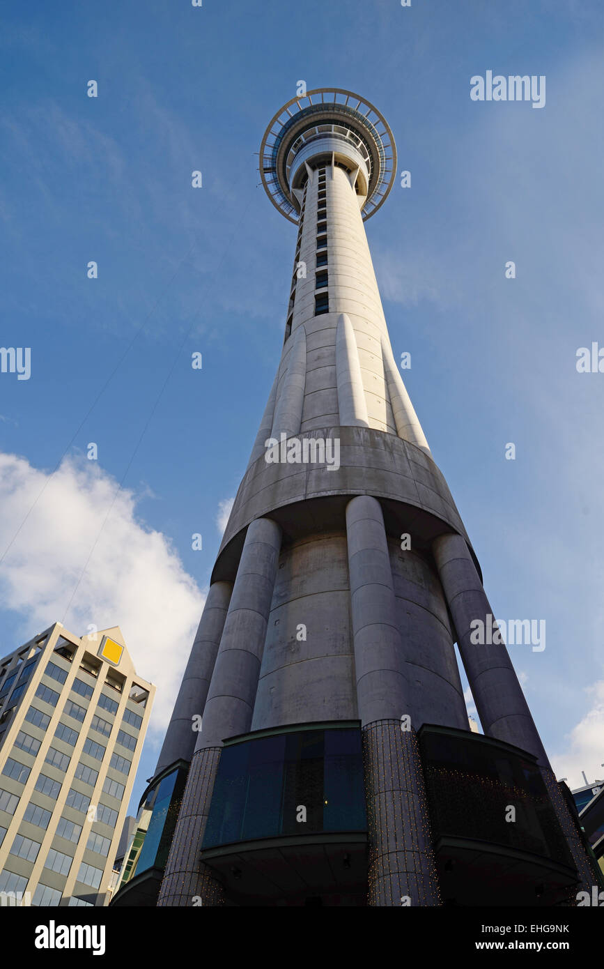 The Sky Tower towers above other buildings in Auckland's central ...