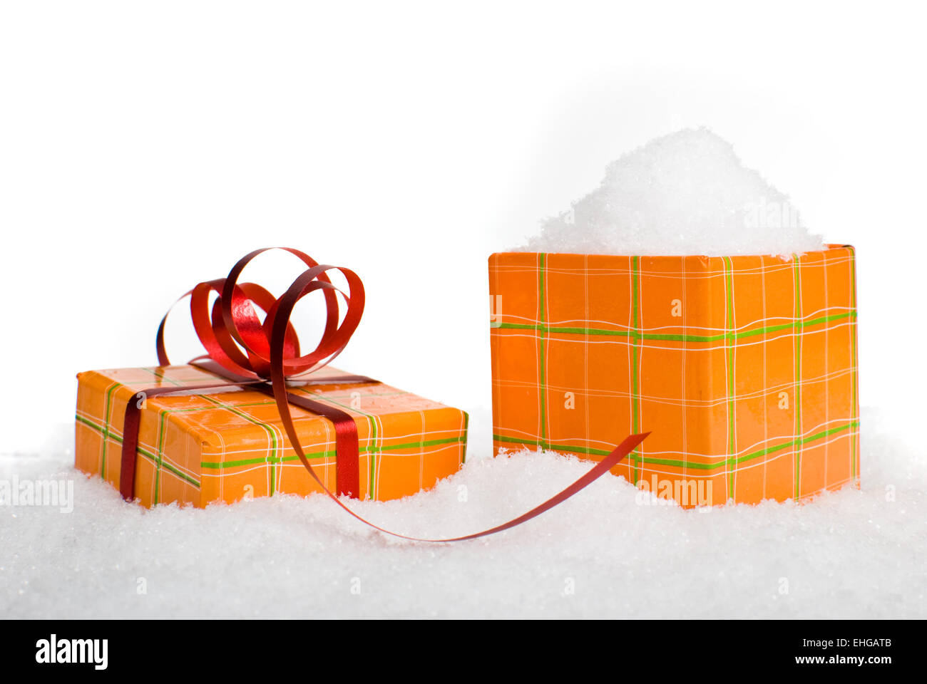 Christmas gift box in snow Stock Photo - Alamy