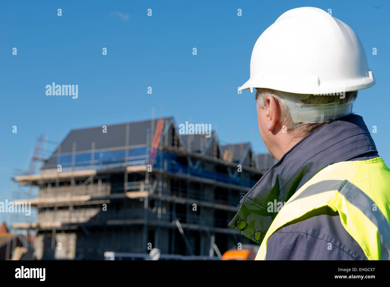 Construction site scaffolding inspection houses hi-res stock ...