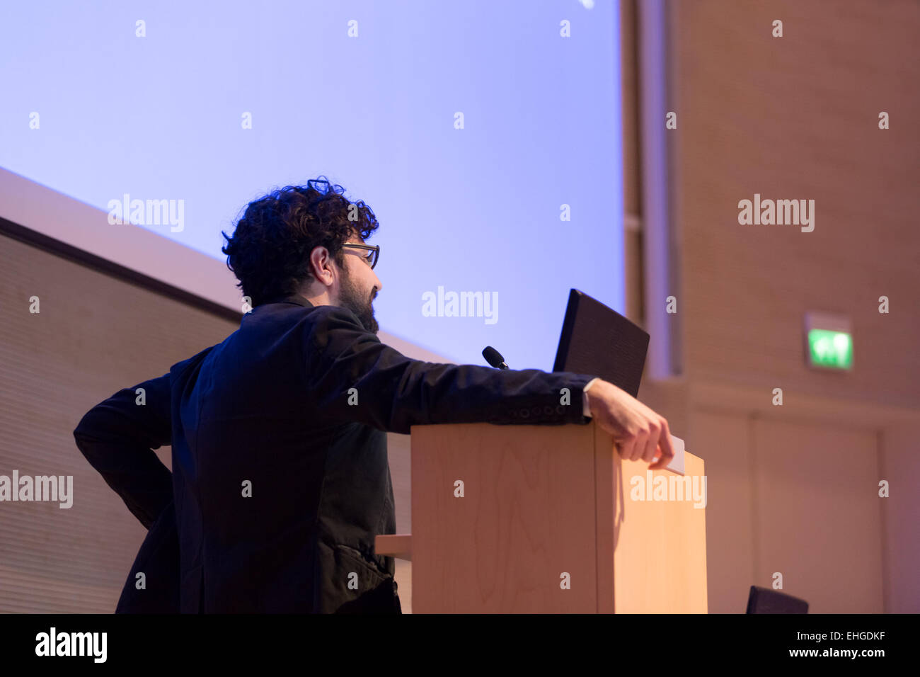 Speaker giving talk on podium at Business Conference Stock Photo - Alamy
