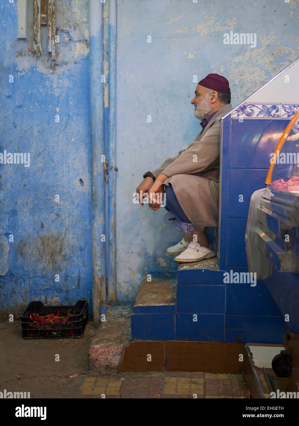 A market worker taking a break in Tangiers, Morocco Stock Photo - Alamy