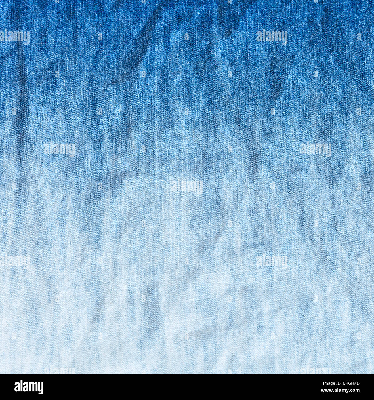blue and white gradient on denim jean - textile background close up ...