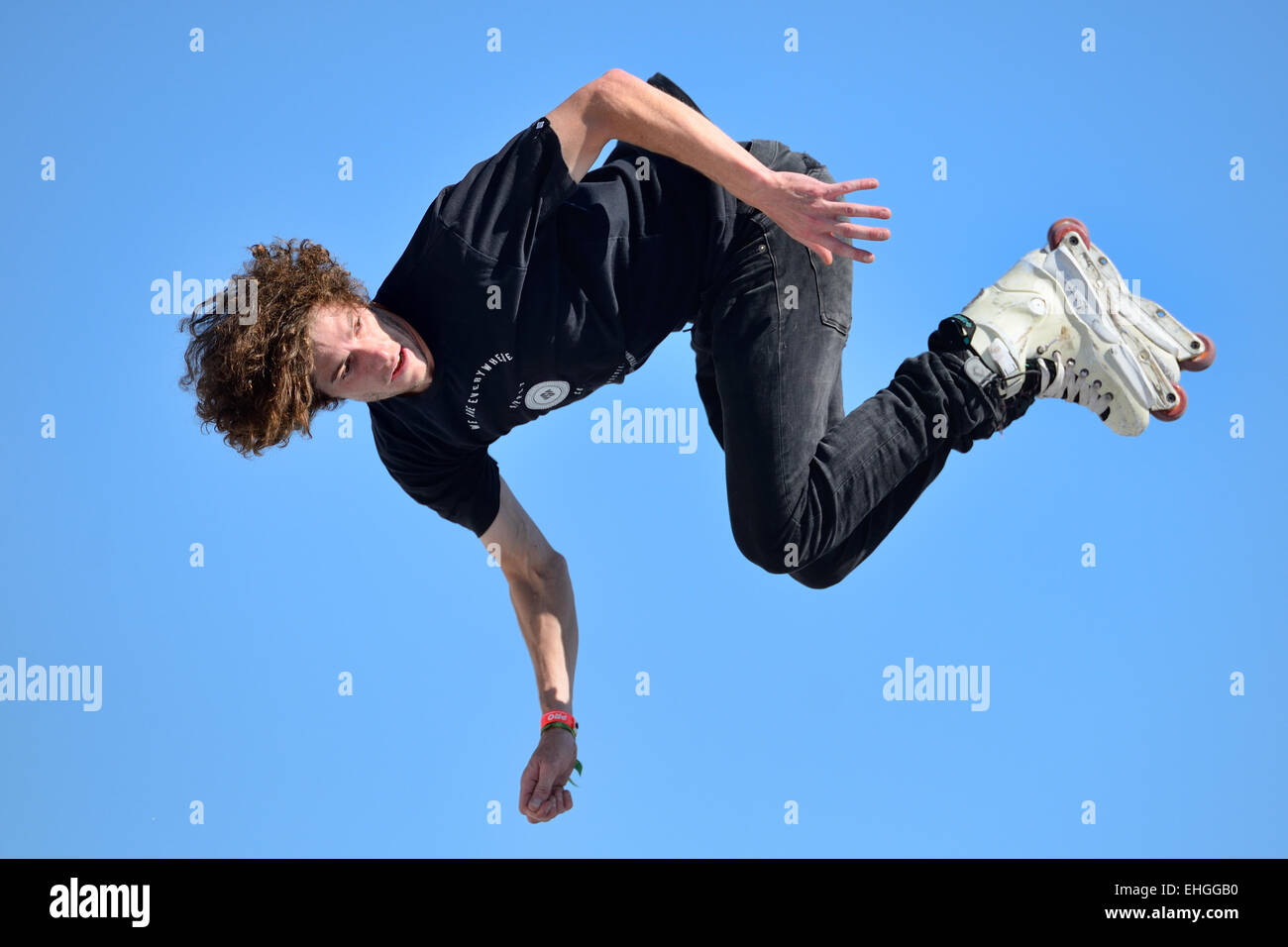 BARCELONA - JUN 28: A professional skater at the Inline skating jumps ...