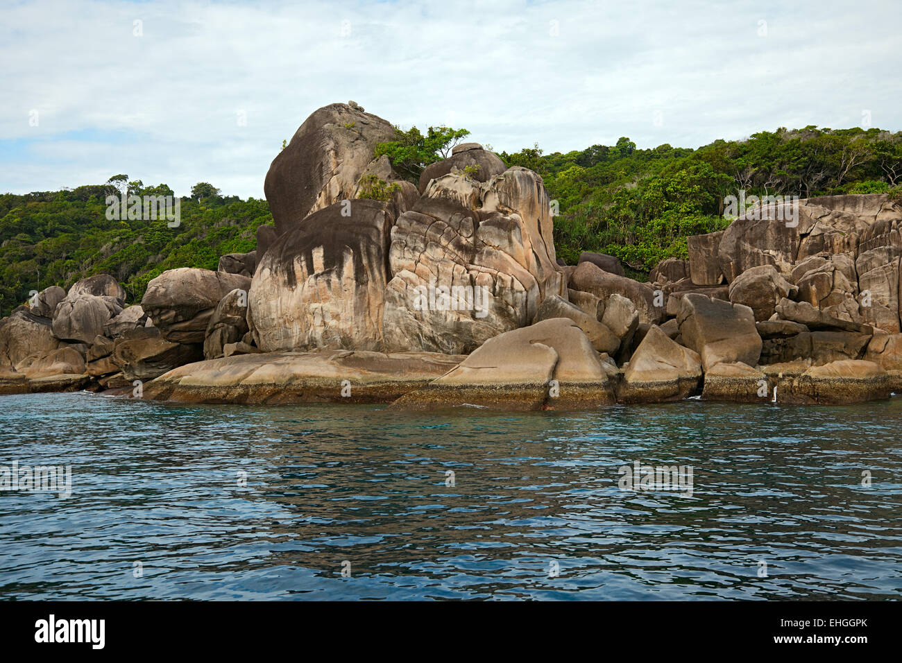 Rock in the ocean Stock Photo - Alamy