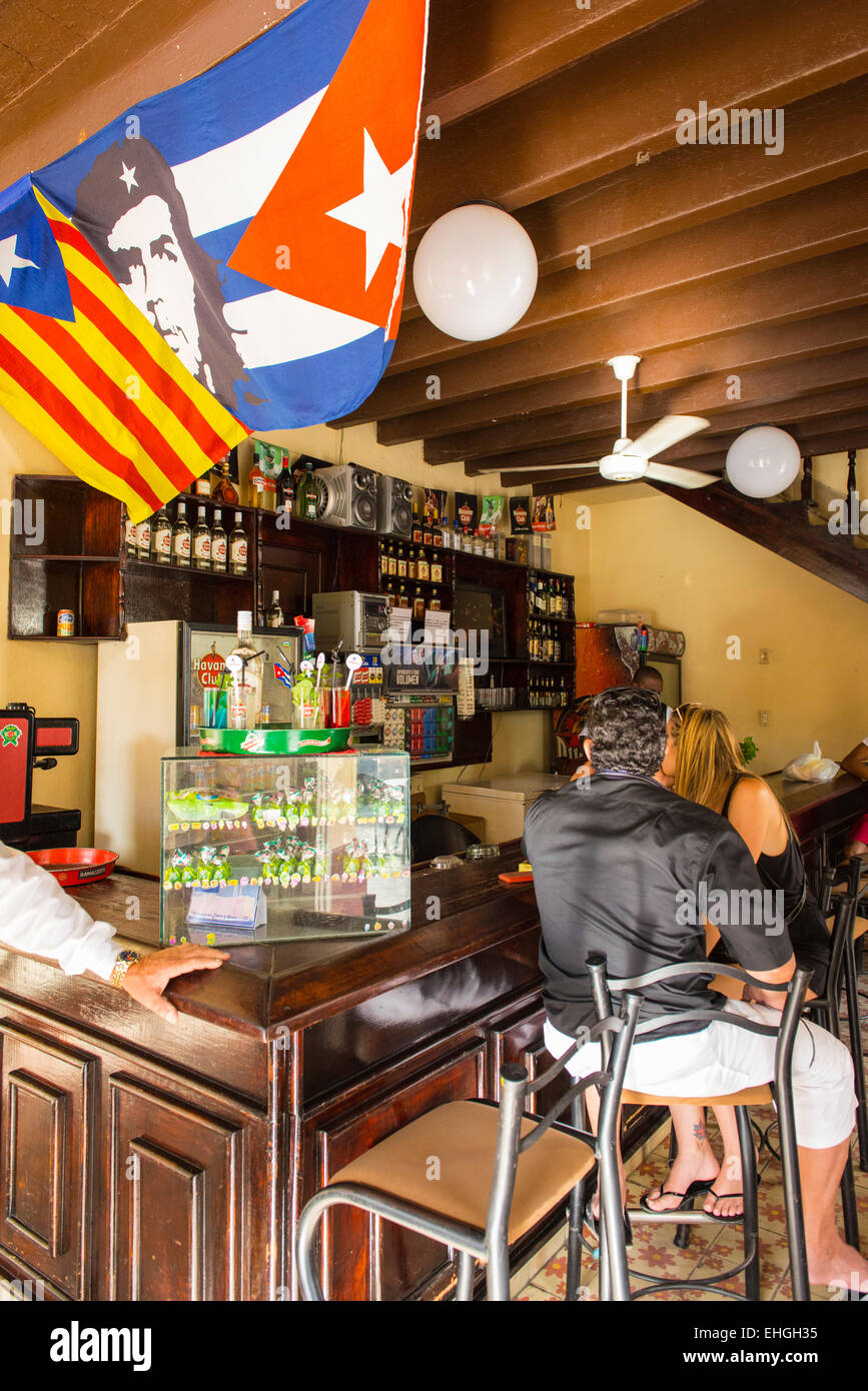 Cuba Santa Clara typical bar scene flags bottles rum Havana Club Stock ...