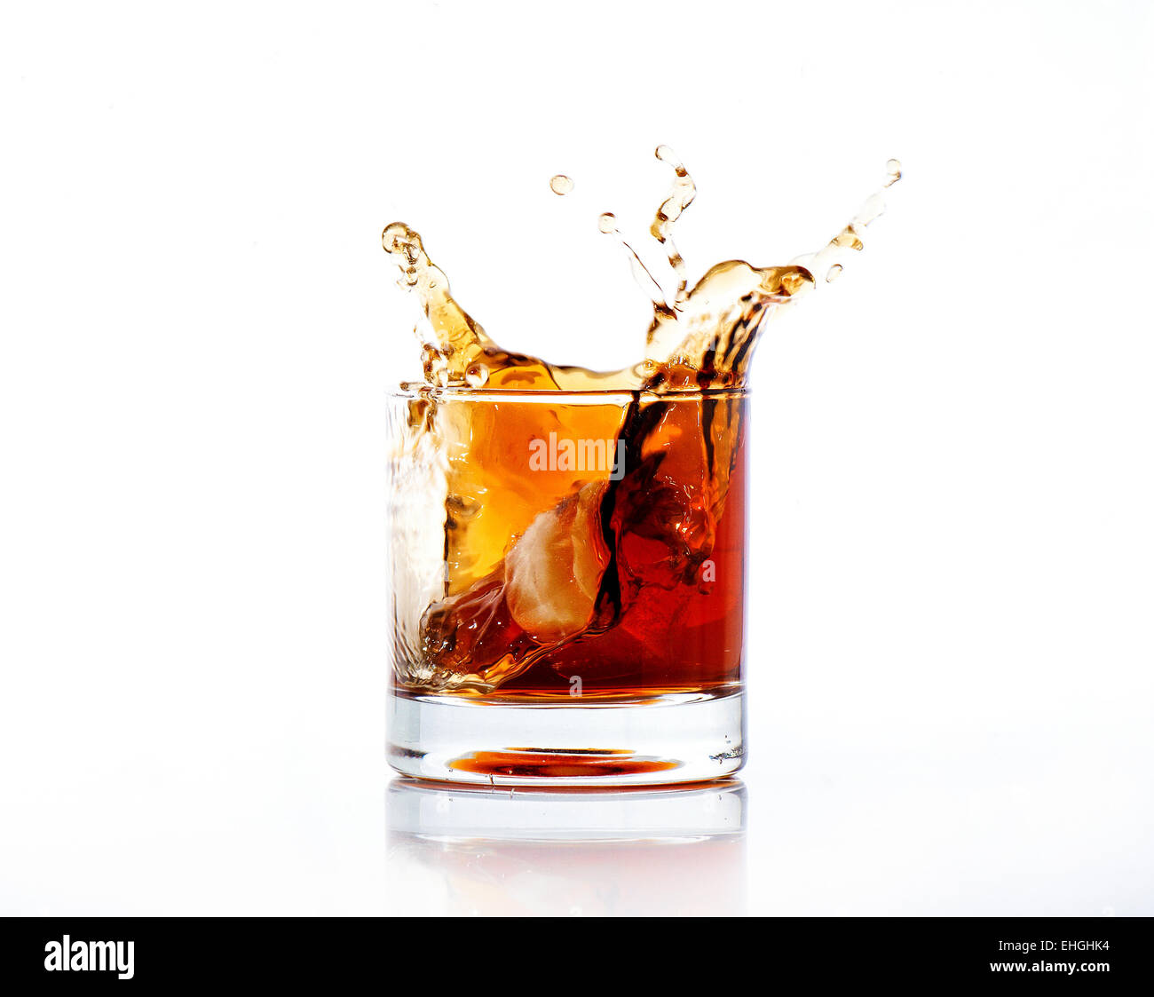 splash of cola in glass isolated on white background Stock Photo - Alamy