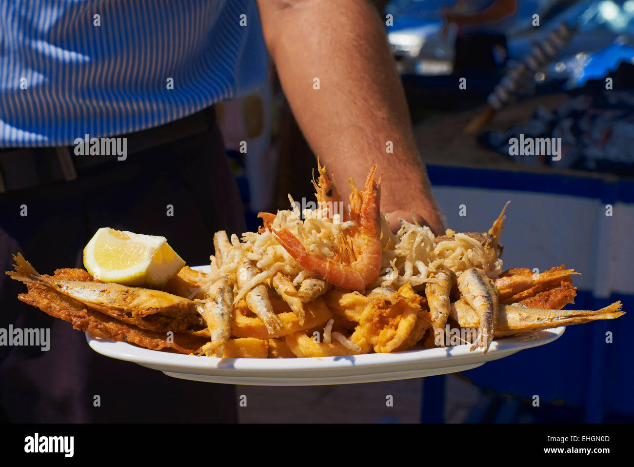 Pescaito frito, Grilled fish on restaurant terrace, Chiringuito ...