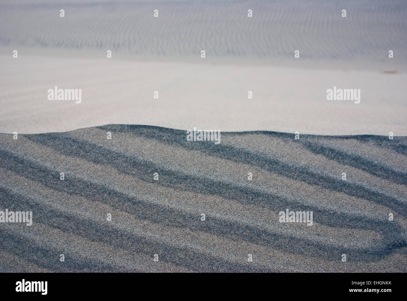 Layers of different colored sand in desert dunes Stock Photo - Alamy