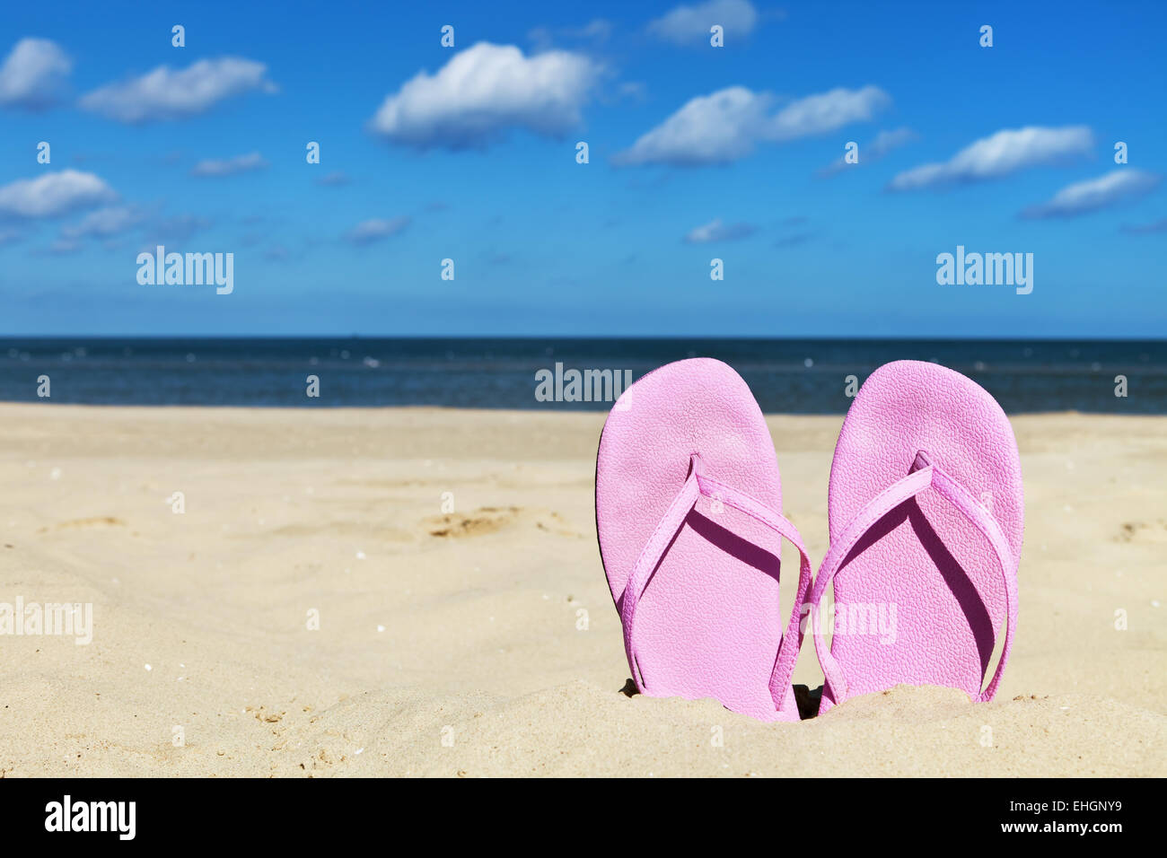 Flip Flops on Beach Stock Photo - Alamy