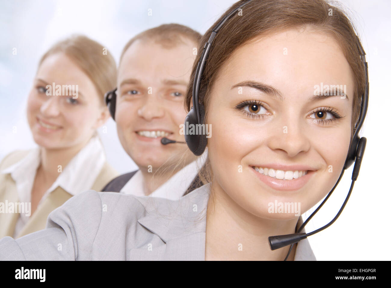 Group of happy customer service people Stock Photo - Alamy