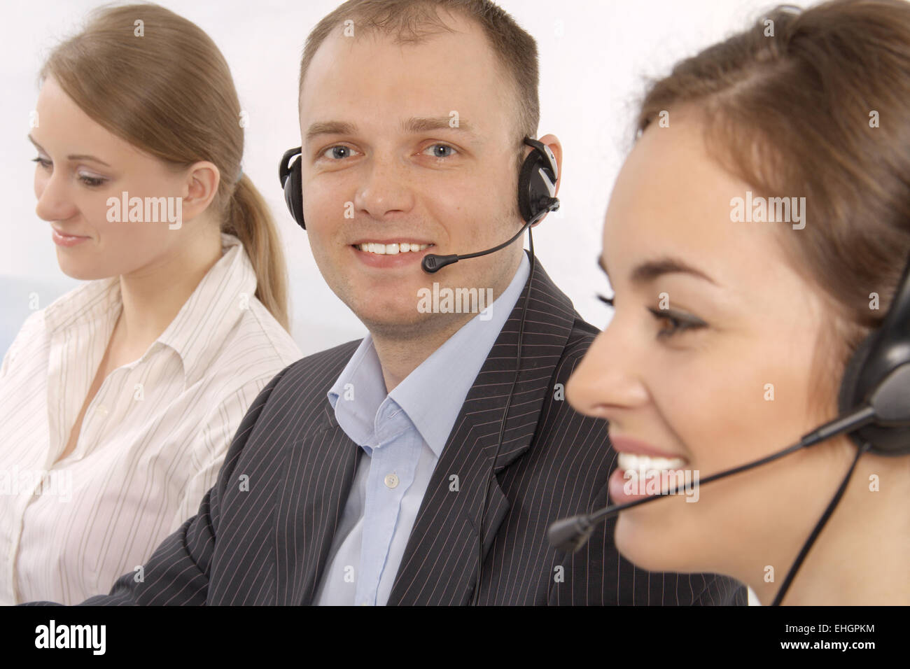 Group of happy customer service people Stock Photo - Alamy