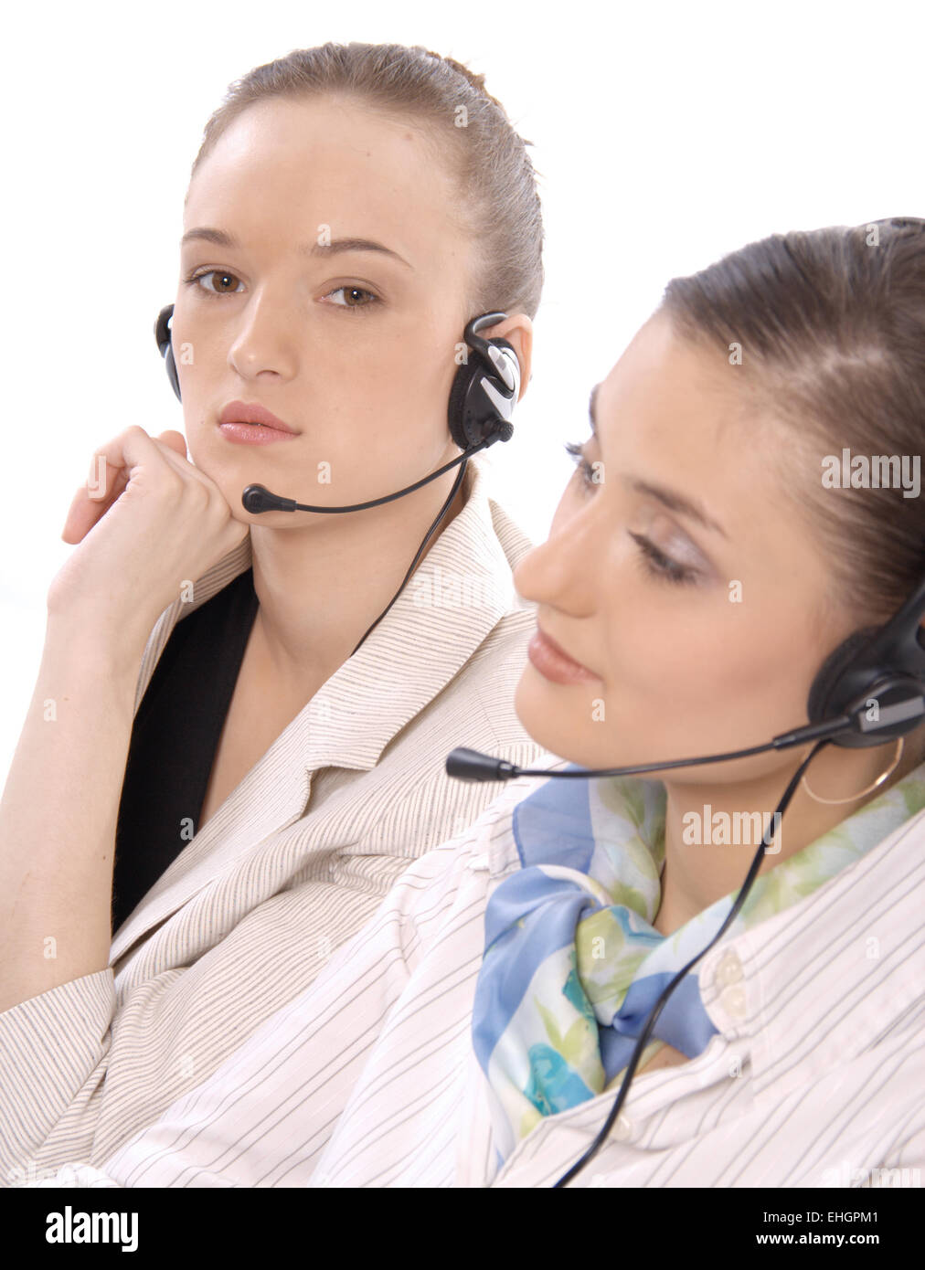 Two customer service representatives work hi-res stock photography and ...