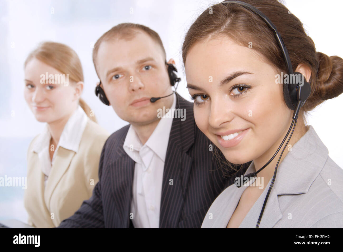 Group of happy customer service people Stock Photo - Alamy