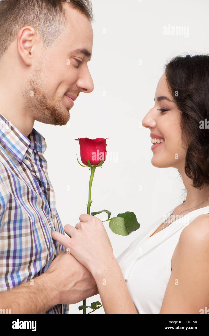 Man giving a rose to his beloved Stock Photo - Alamy
