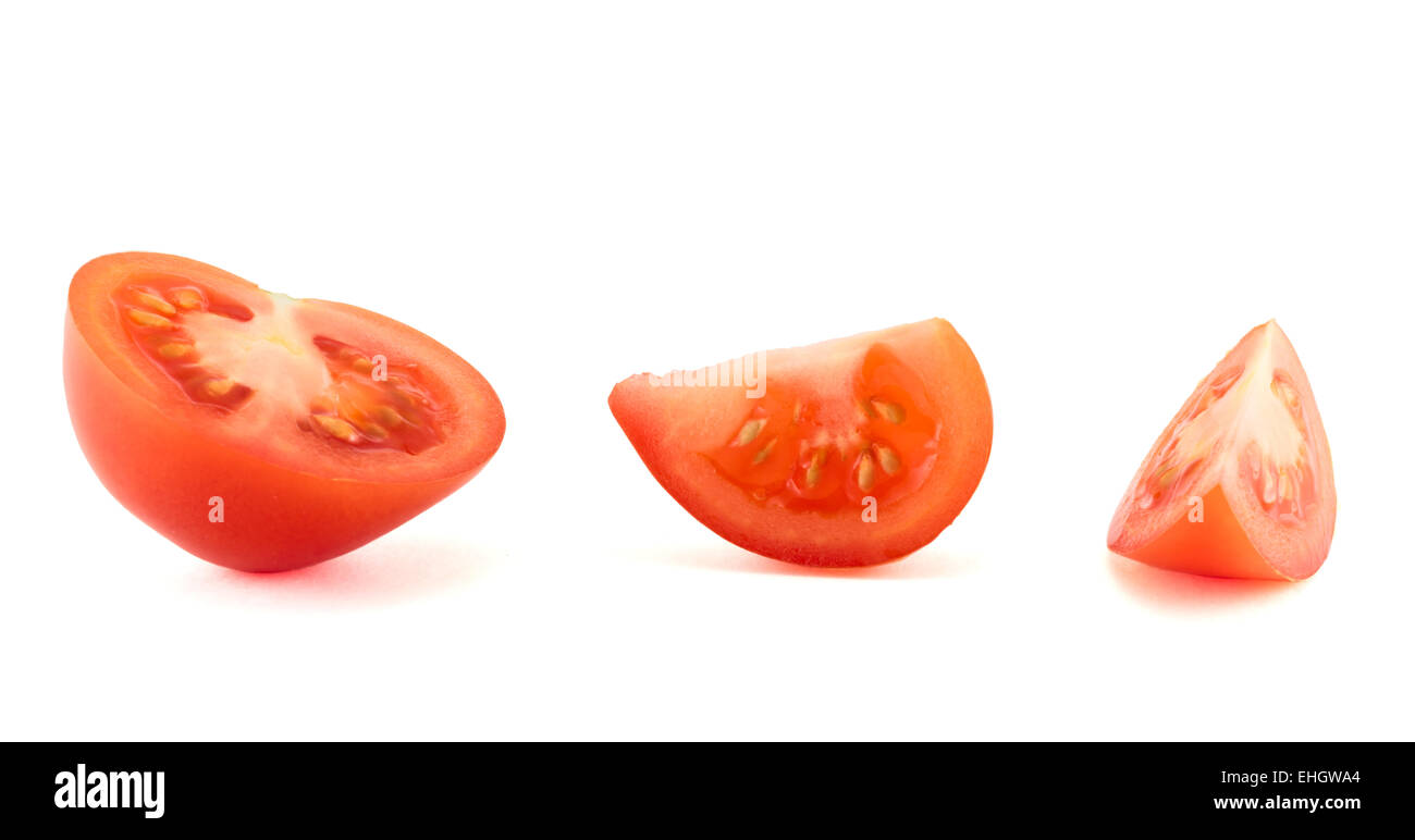 Fresh red tomato cut into pieces, isolated Stock Photo - Alamy