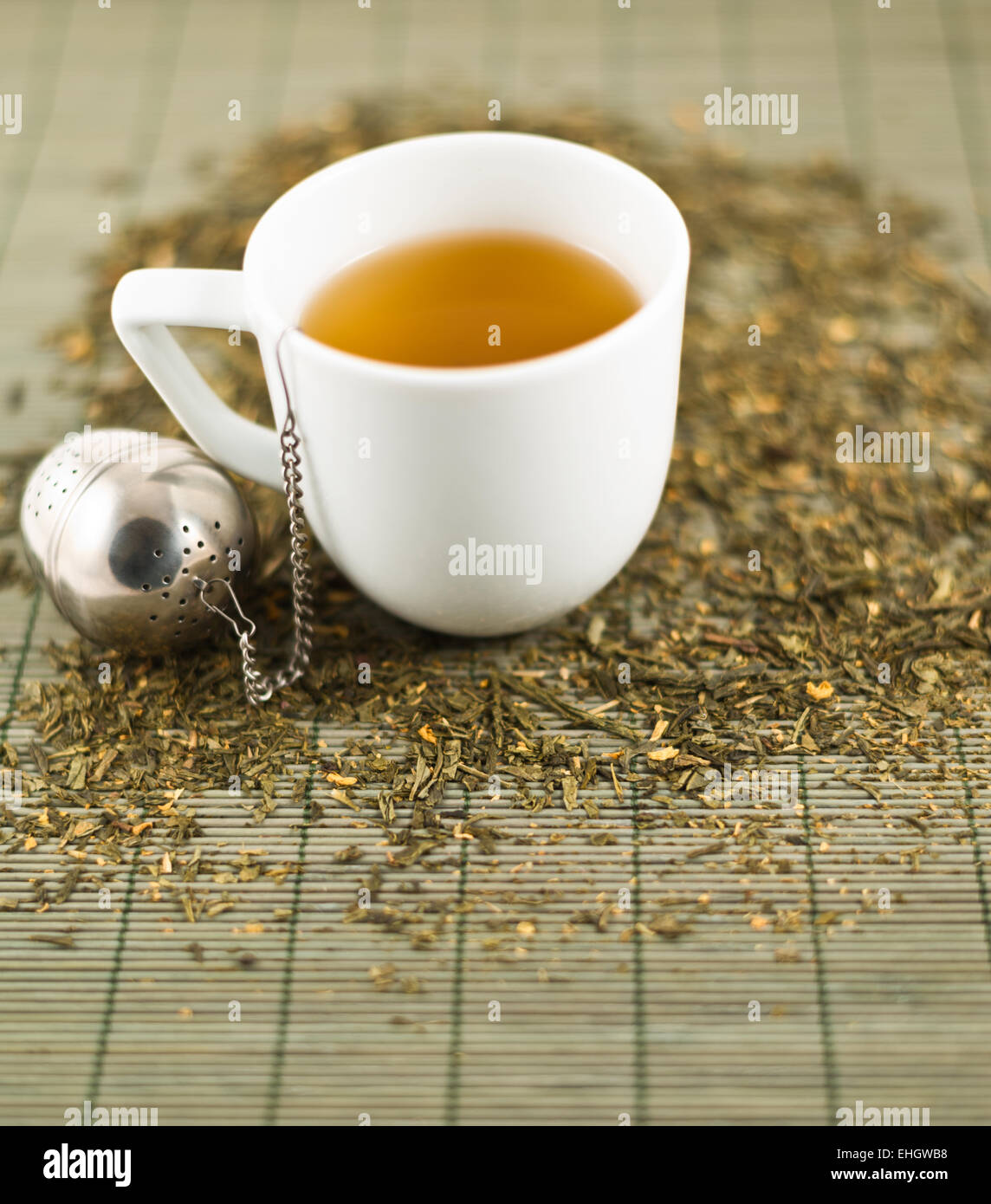 White cup of green tea Stock Photo - Alamy