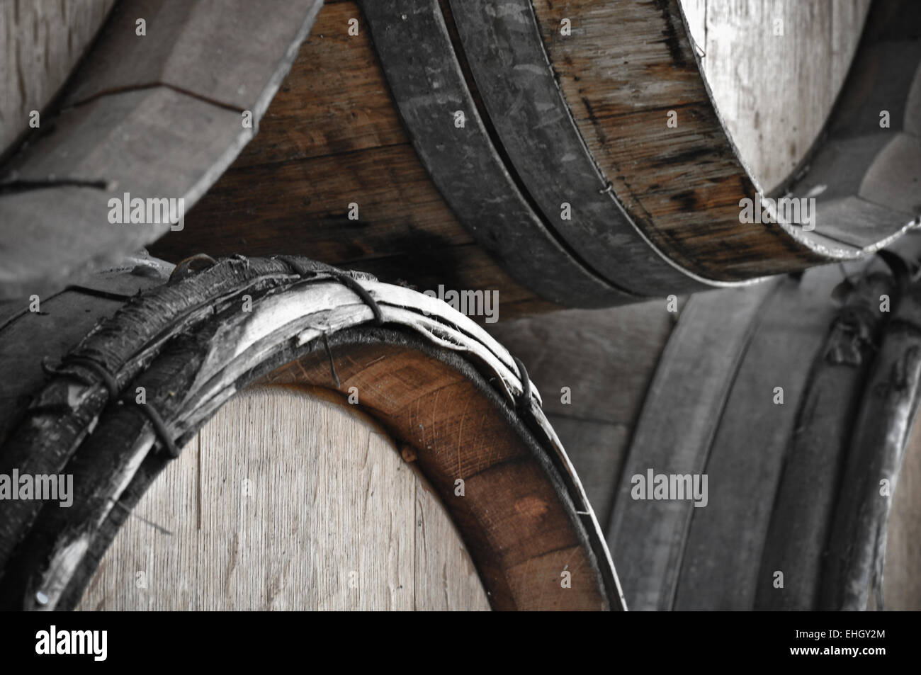Dark Wine Barrels to store vintage wine Stock Photo - Alamy