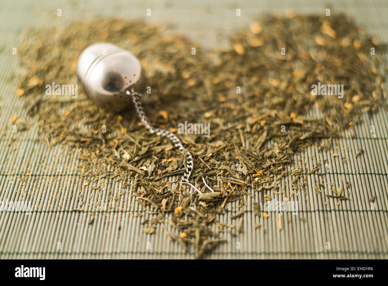 Green tea heart shape sideview Stock Photo - Alamy