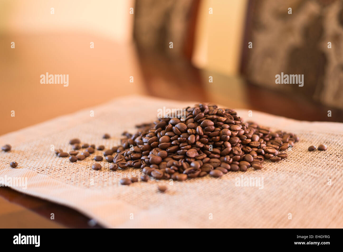 Coffee beans on tissue mat Stock Photo - Alamy