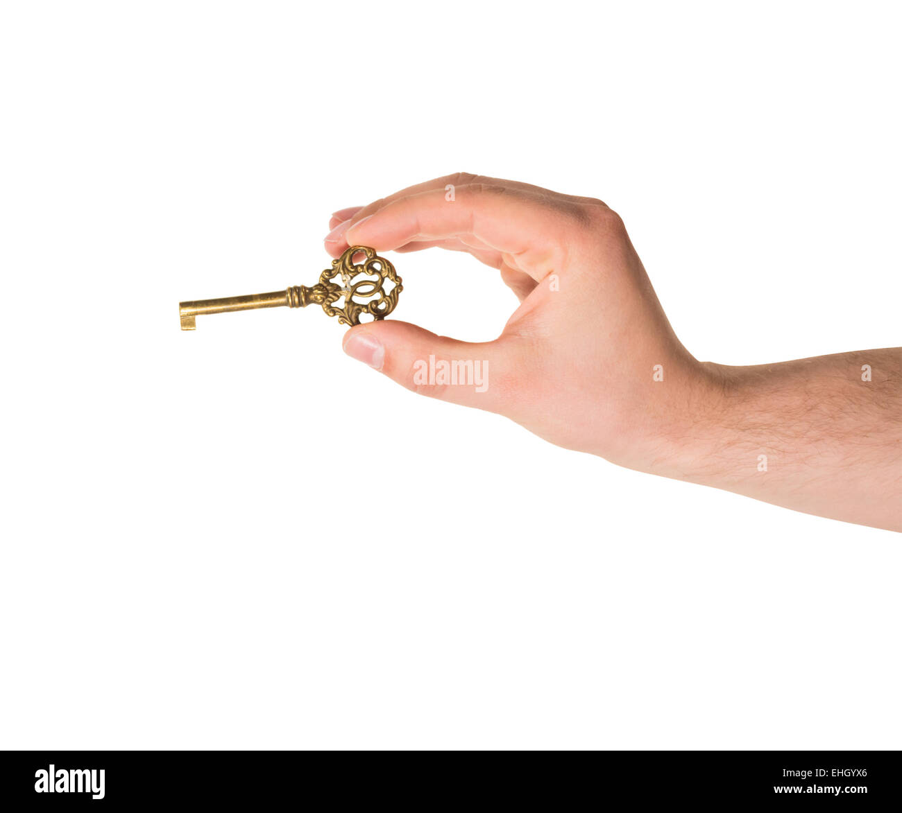 Hand holding a key isolated Stock Photo - Alamy