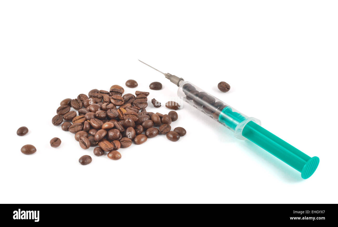 Medical syringe full of coffee Stock Photo - Alamy
