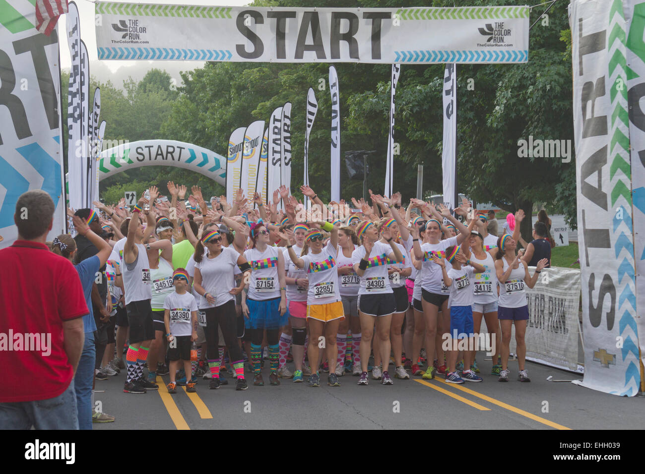 Excited Color Run racers before taking off from the starting line on ...