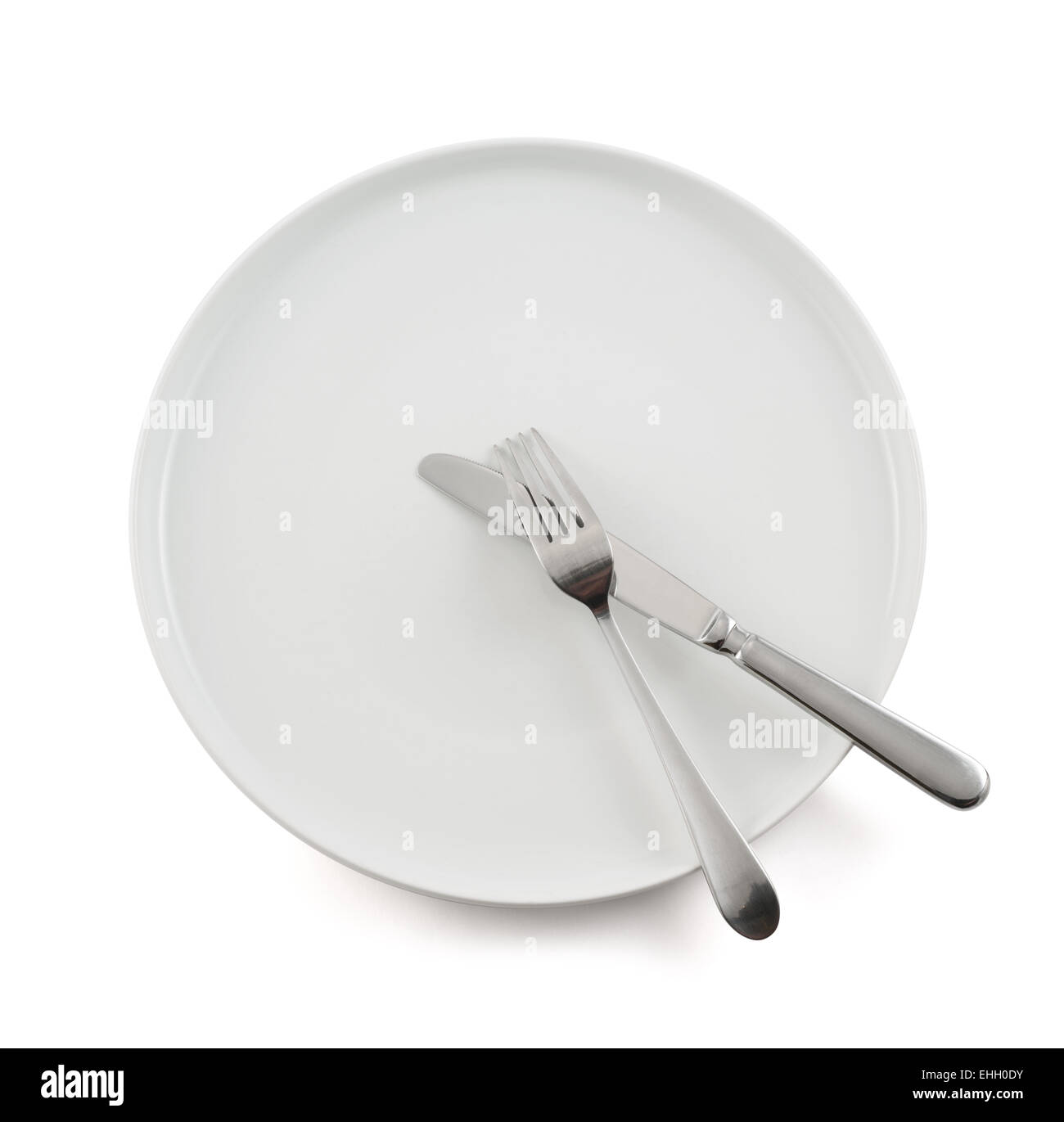 Table knife, fork and ceramic plate isolated Stock Photo - Alamy