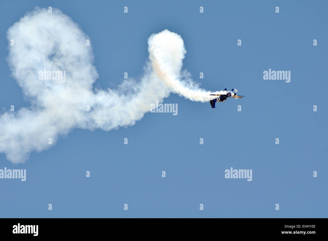 Trick Airplane with Smoke Stock Photo - Alamy