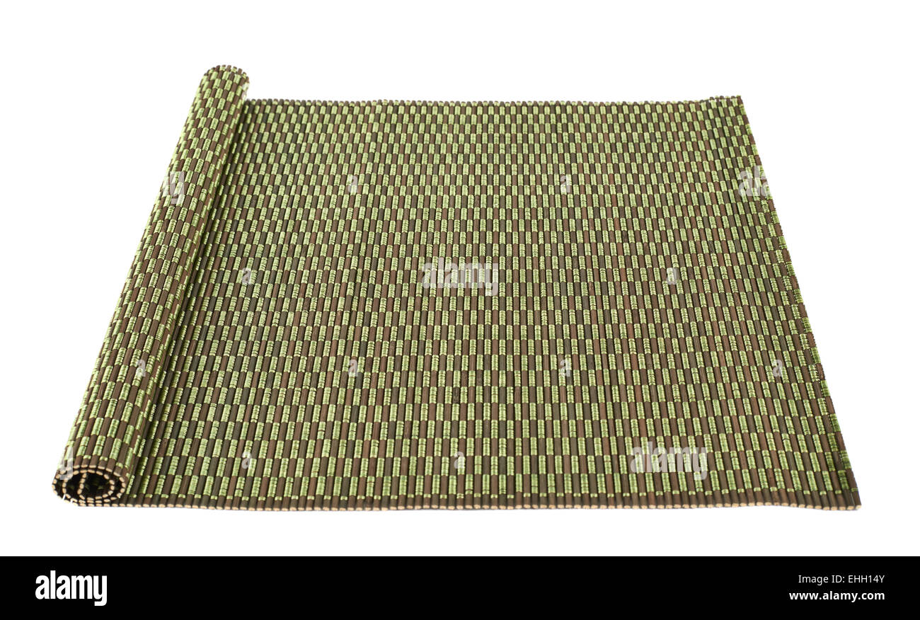 Rolled straw mat isolated Stock Photo - Alamy
